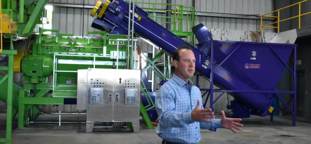 What costs $1.6M, eats packaged food by the ton and produces compost ...